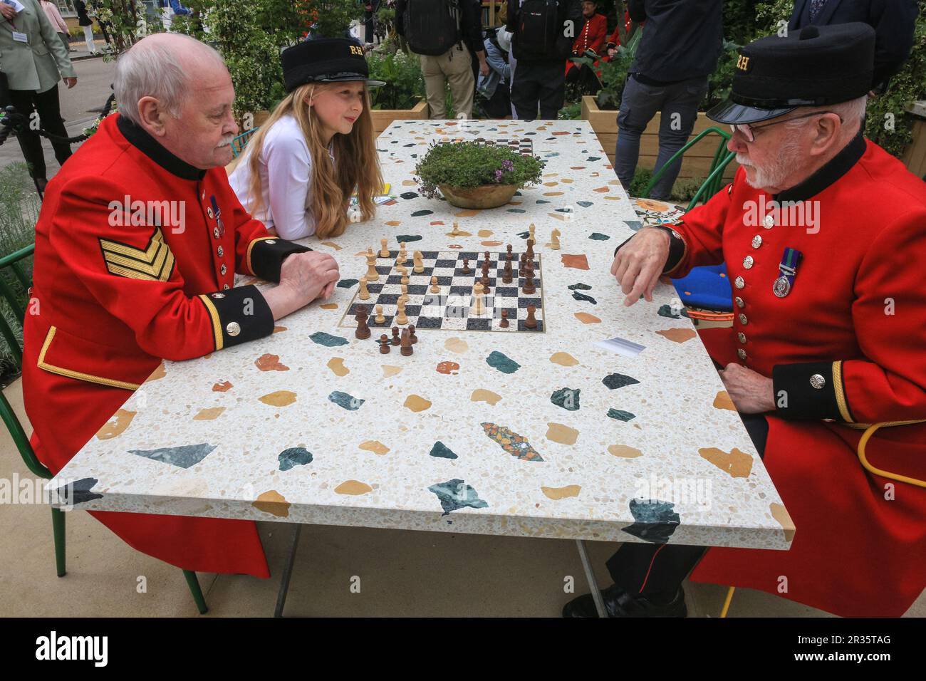 London, UK. 22nd May, 2023. Chelsea Pensioners playing on the garden ...