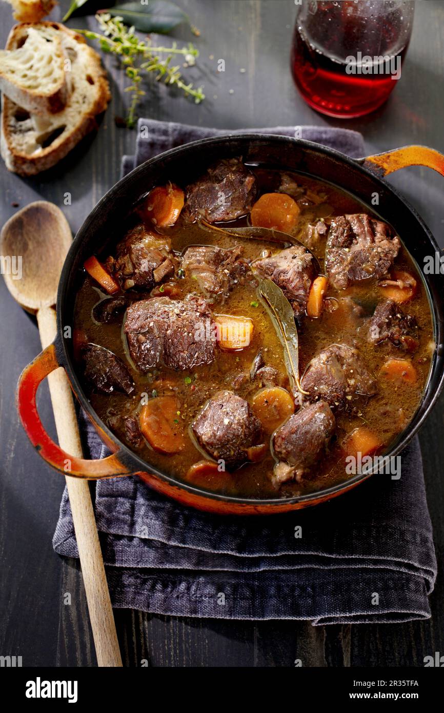 Game stew with carrots Stock Photo - Alamy
