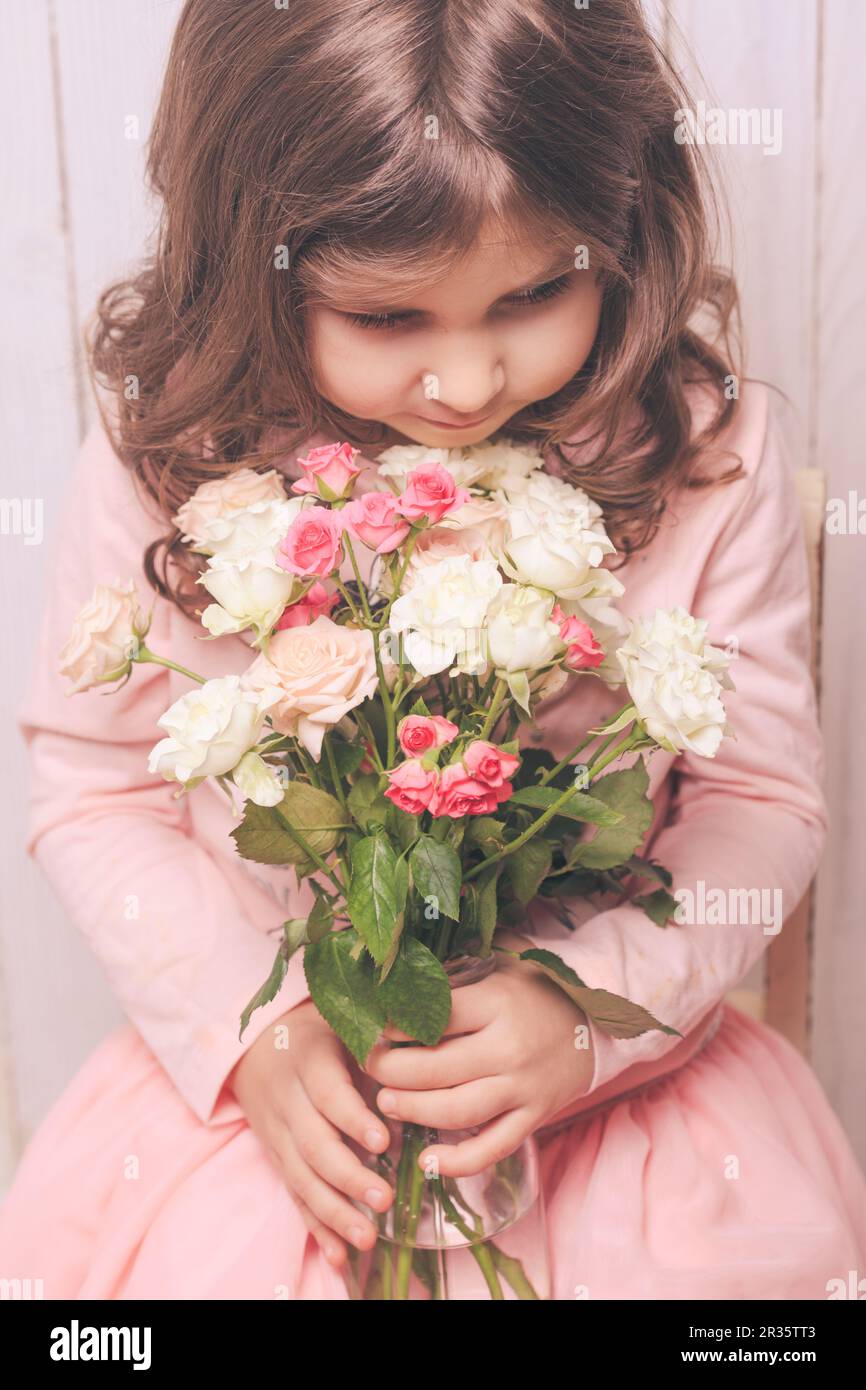 Girl with roses Stock Photo - Alamy