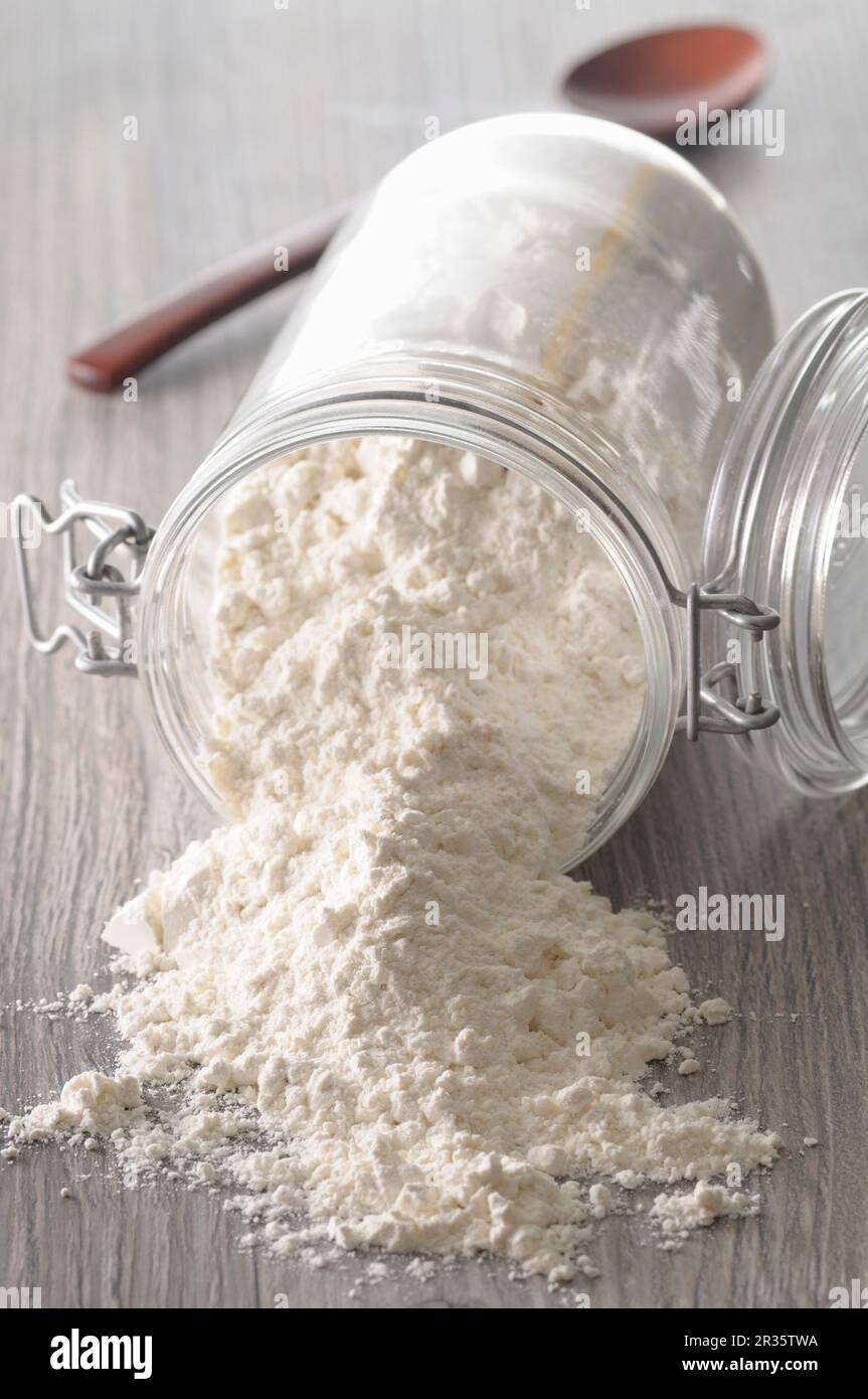 Flour in an overturned jar Stock Photo - Alamy
