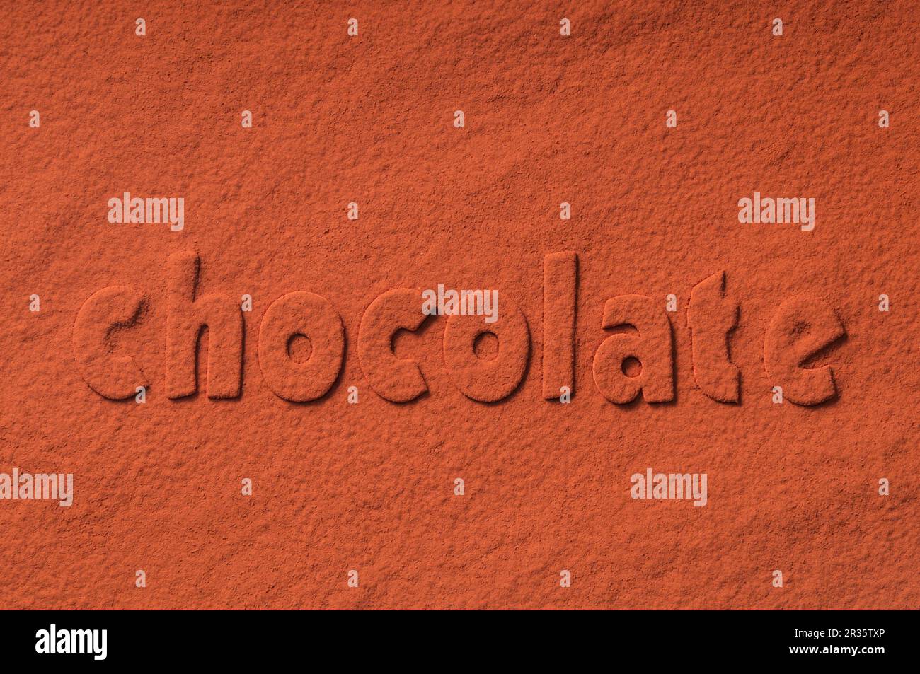 The word 'chocolate' written in cocoa powder Stock Photo - Alamy