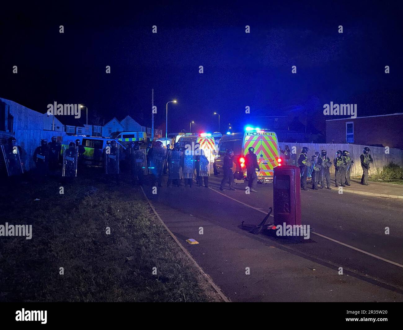 Police officers on Wilson Road in Cardiff as they face a "large scale ...