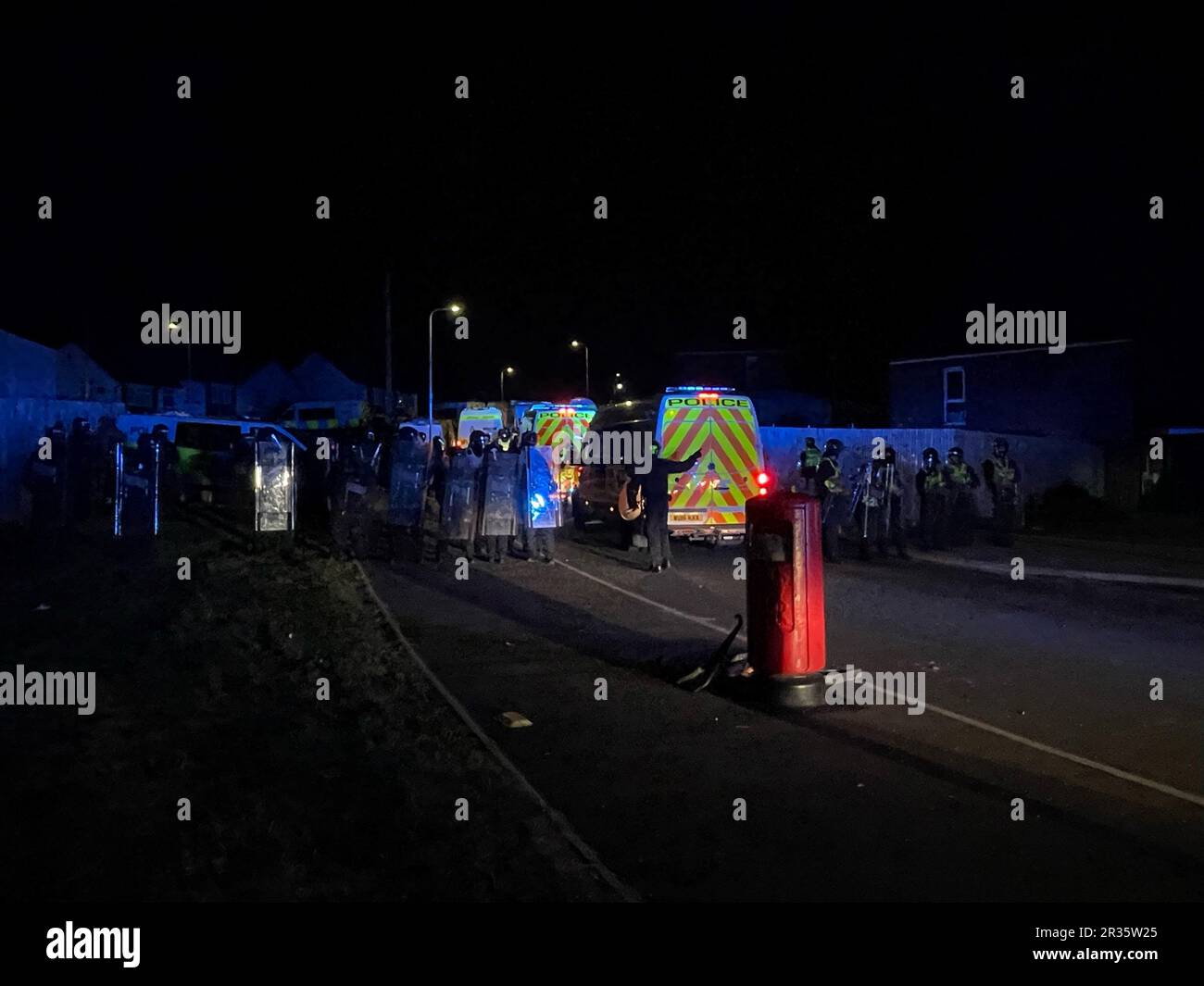 Police officers on Wilson Road in Cardiff as they face a "large scale ...