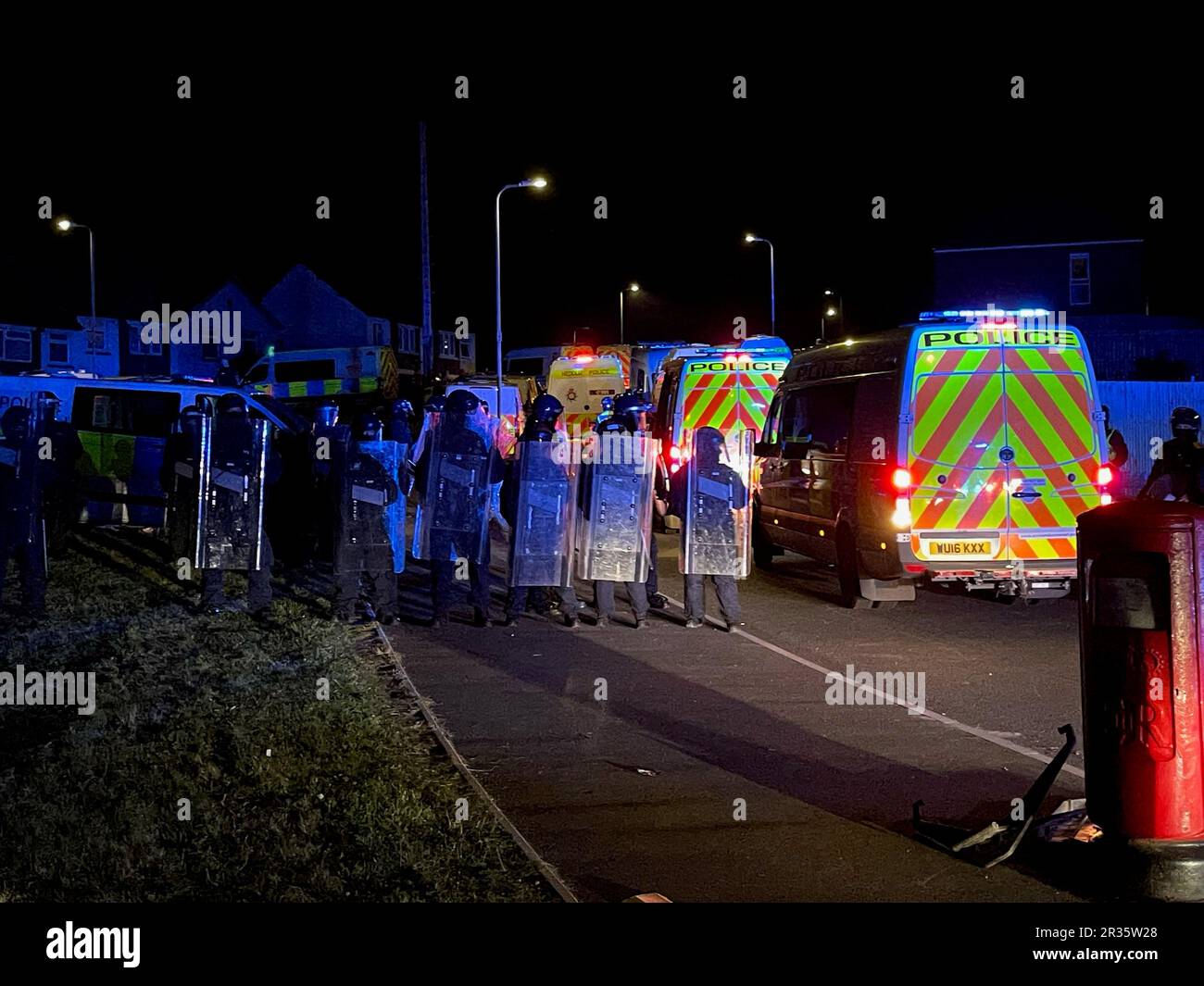 Police officers on Wilson Road in Cardiff as they face a "large scale ...