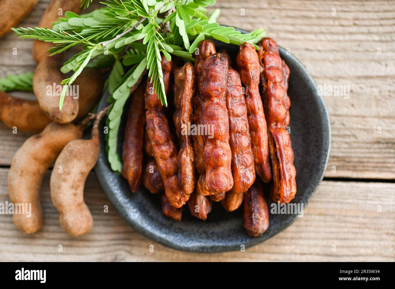 Tamarind sweet for food fruit ripe tamarinds on plate and white ...