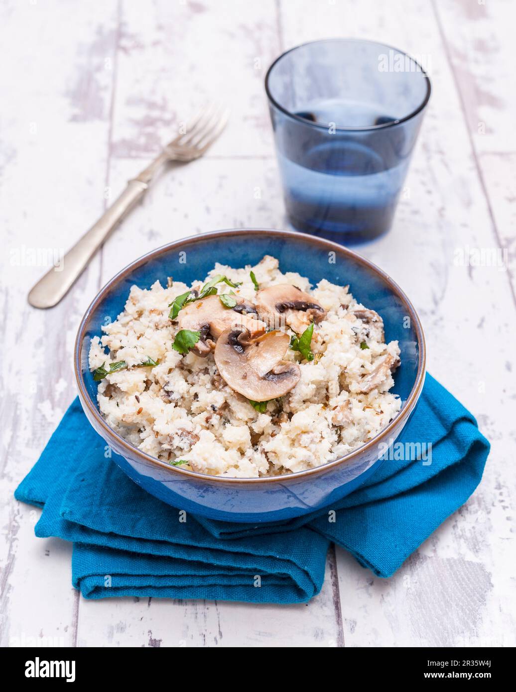 Mushroom risotto with cauliflower Stock Photo - Alamy