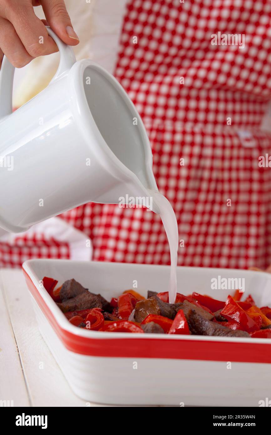 Sauce being poured over hi-res stock photography and images - Alamy