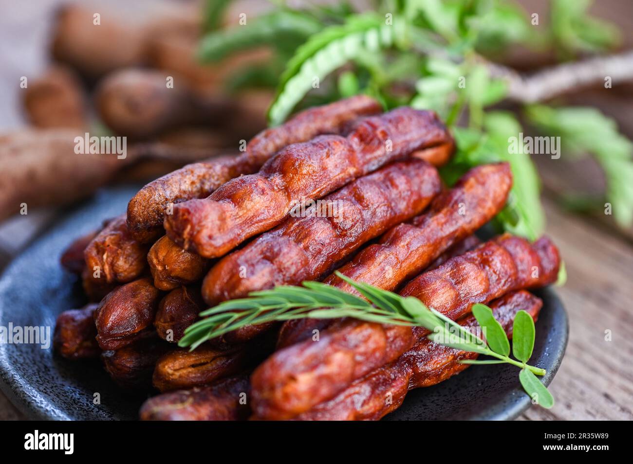 Tamarind sweet for food fruit ripe tamarinds on plate and white ...