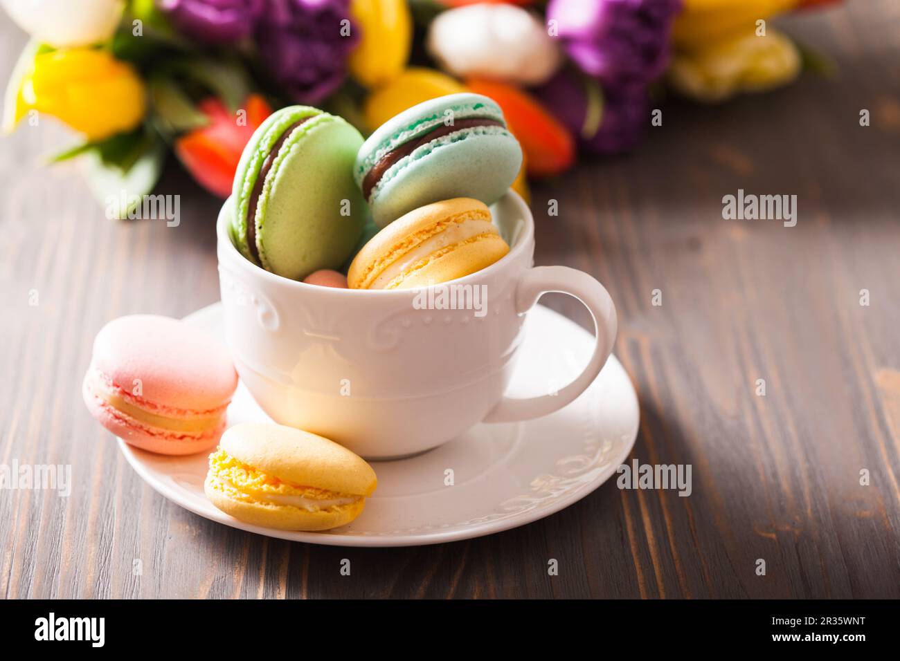 Color macaroons in a cup Stock Photo - Alamy