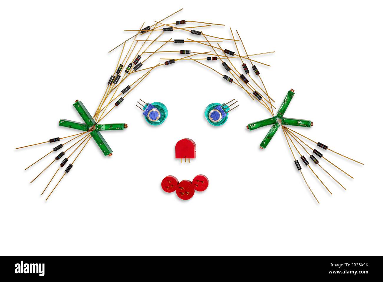 Electronic components in the shape of a child, a young girl, on white ...