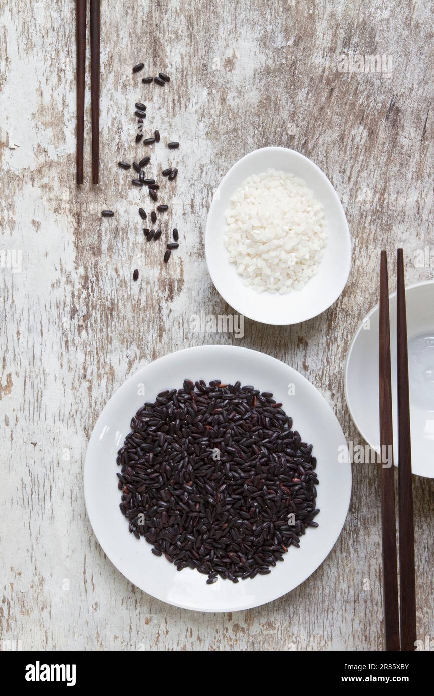 Black rice and white rice Stock Photo - Alamy