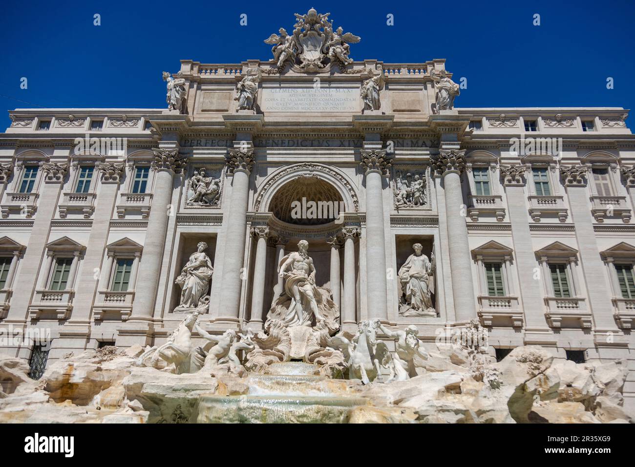 The trevi fountain with the word Benedictus XIV is a popular tourist ...