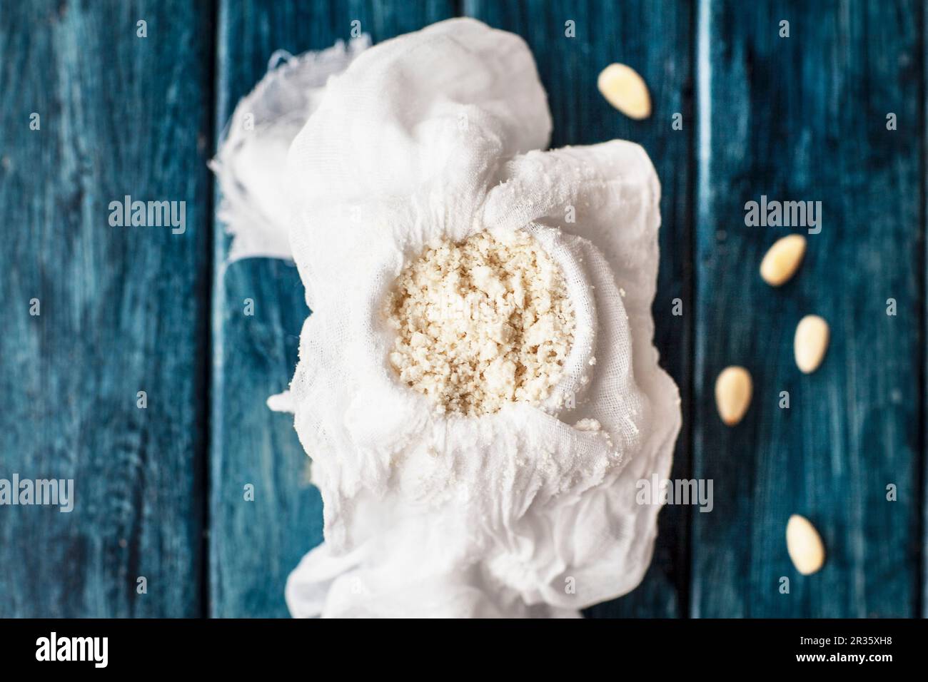 Vegan almond milk being made from crushed almonds Stock Photo - Alamy