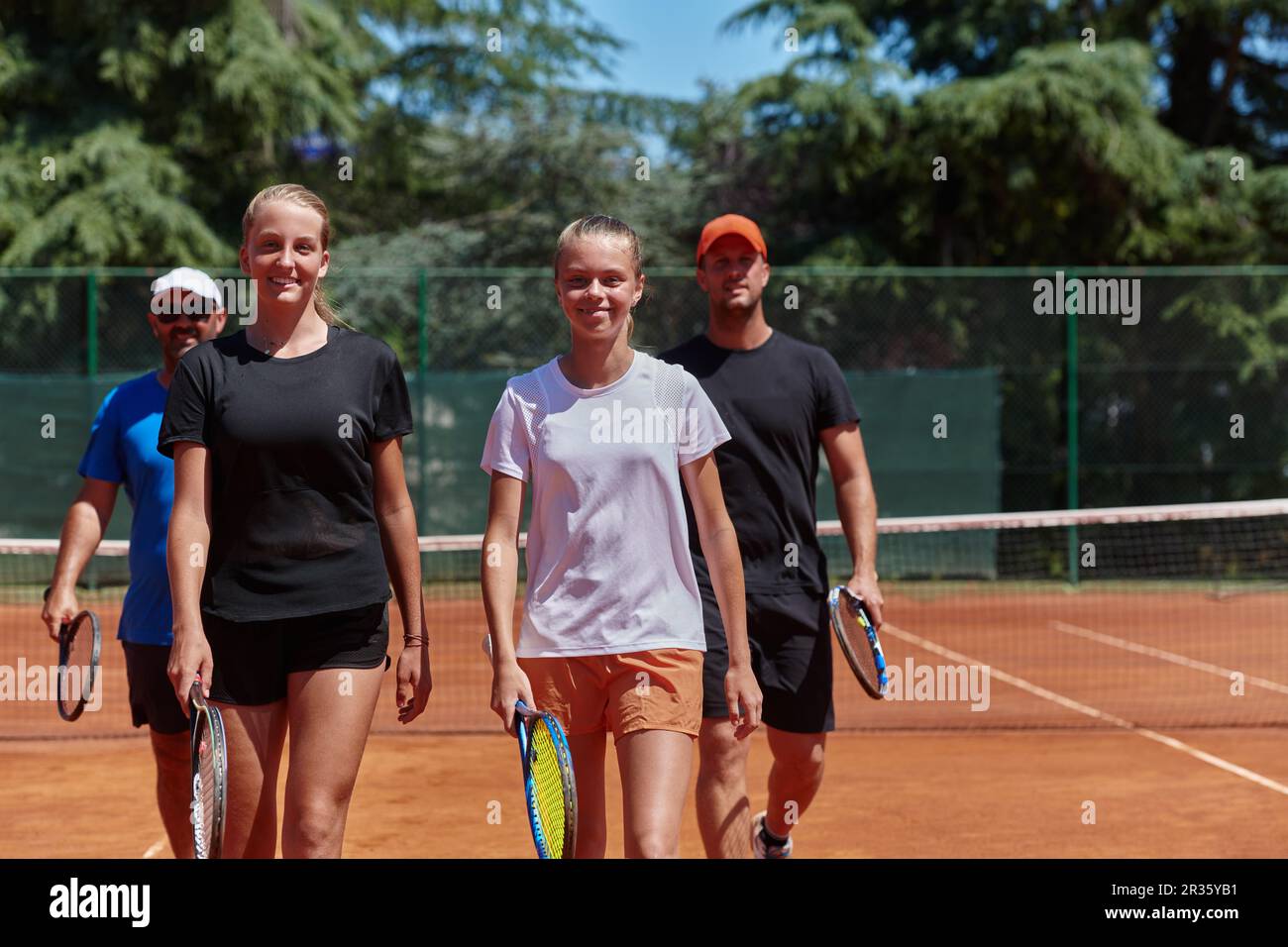 Tennis club together after hard training, showing their dedication ...