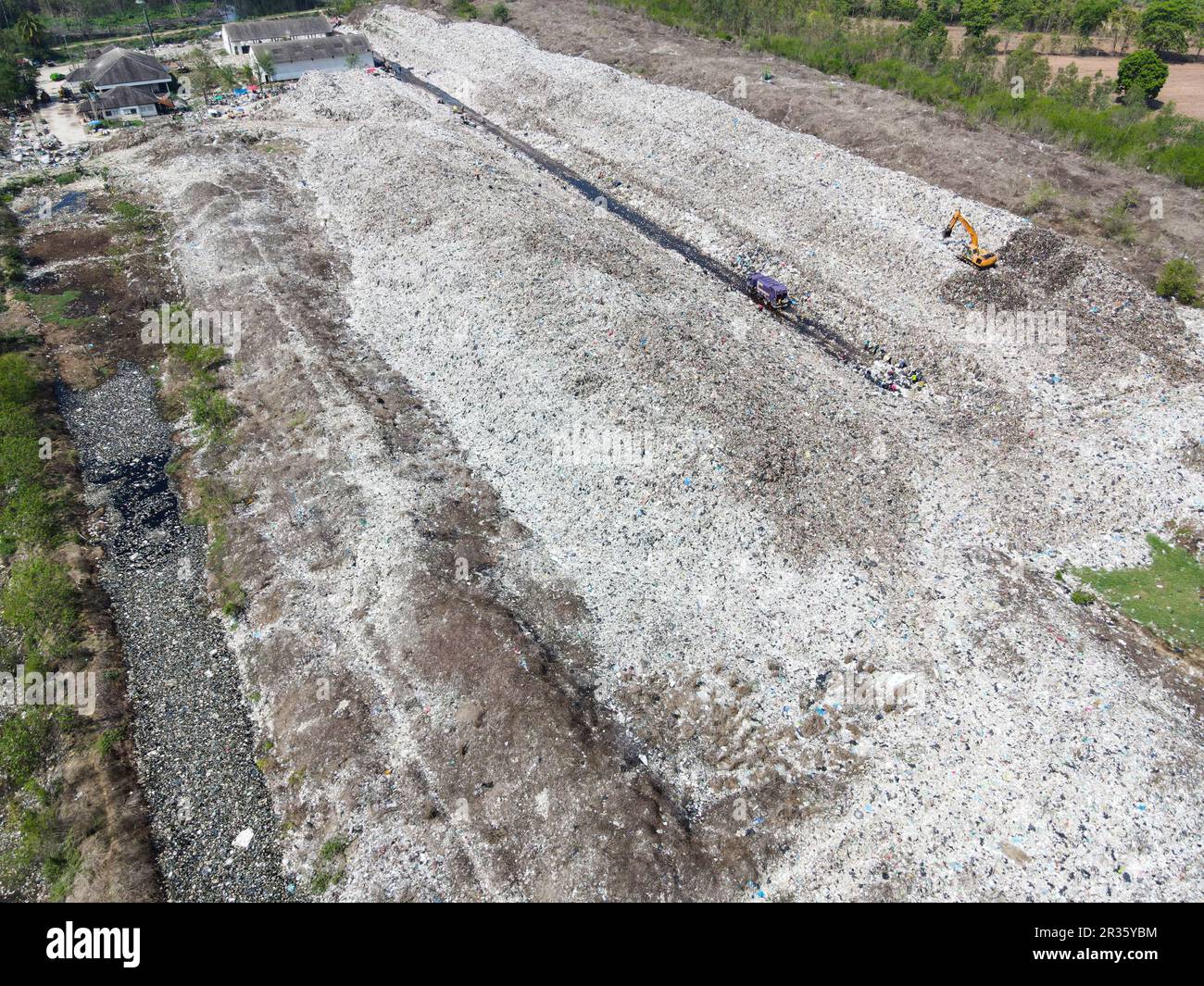 Aerial view landfill garbage waste huge dump environmental pollution ...