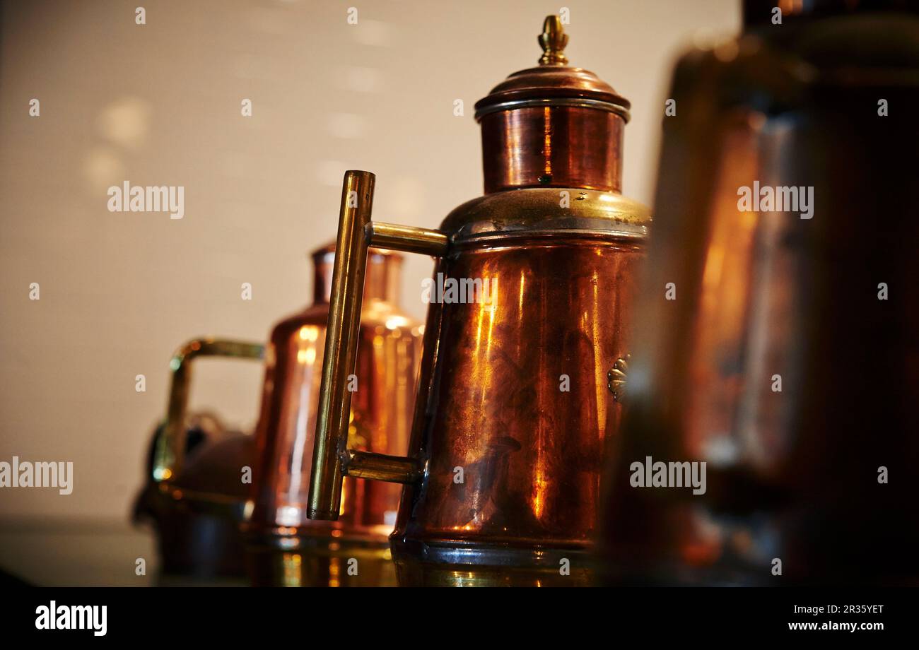 Copper cans of olive oil Stock Photo - Alamy