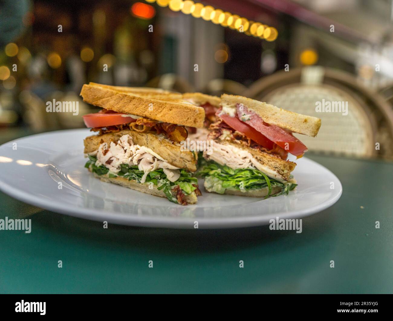 A club sandwich in a restaurant Stock Photo - Alamy