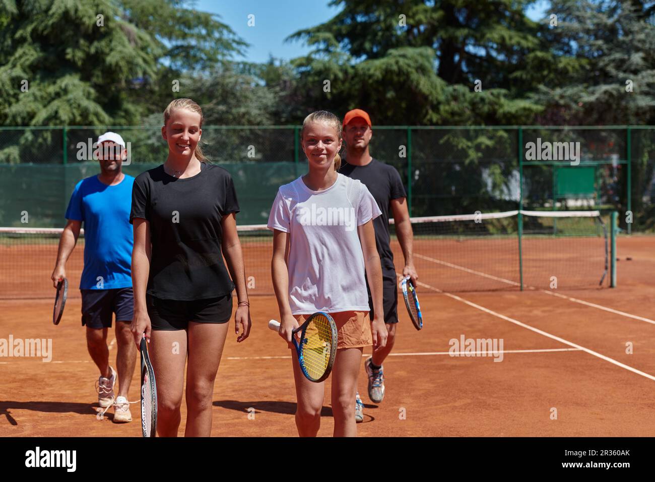 Tennis club together after hard training, showing their dedication ...