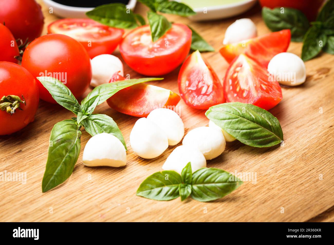 Caprese salad preparing Stock Photo - Alamy