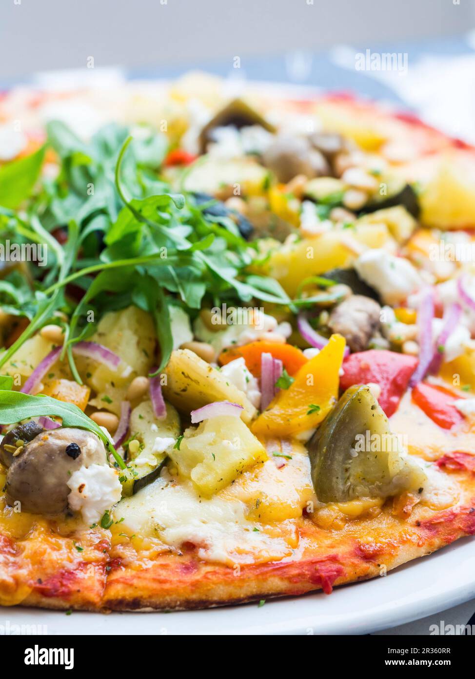Vegetarian pizza with vegetables and rocket Stock Photo - Alamy