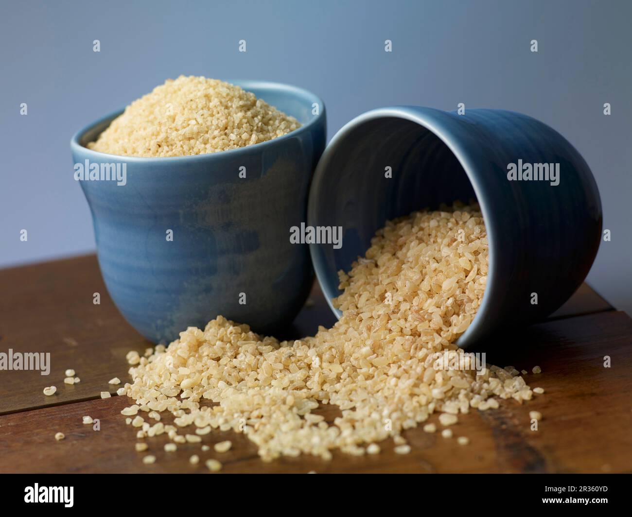 Bulgur and couscous in blue bowls Stock Photo - Alamy