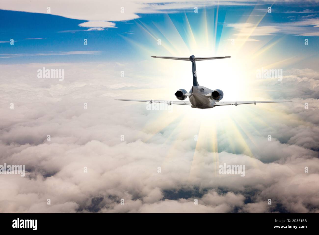 Flying an airplane in morning sun Stock Photo - Alamy