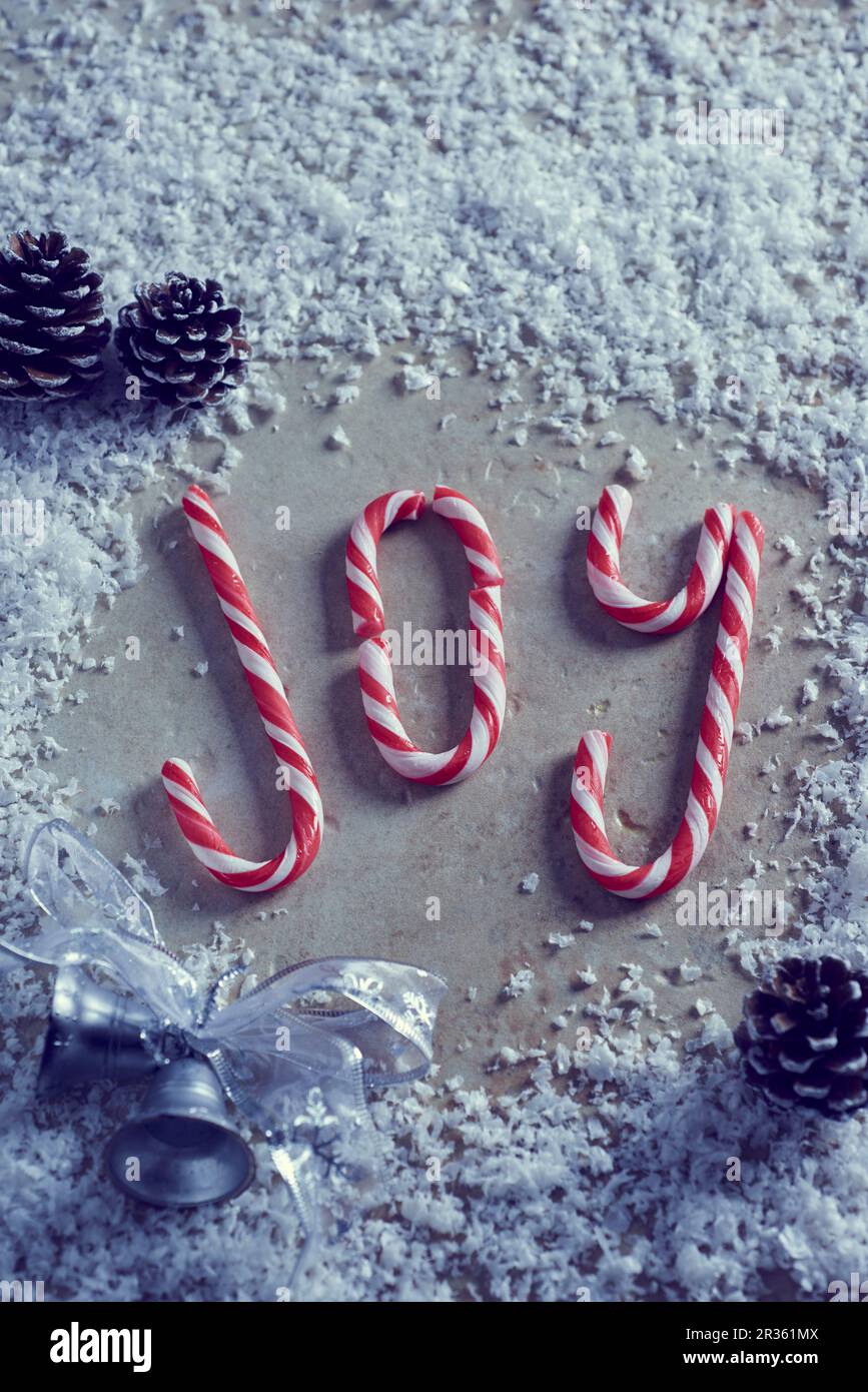 The word 'Joy' written in candy canes Stock Photo - Alamy