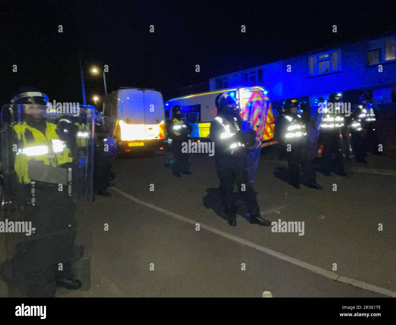 Police officers on Howell Road in Cardiff as they face a "large scale ...