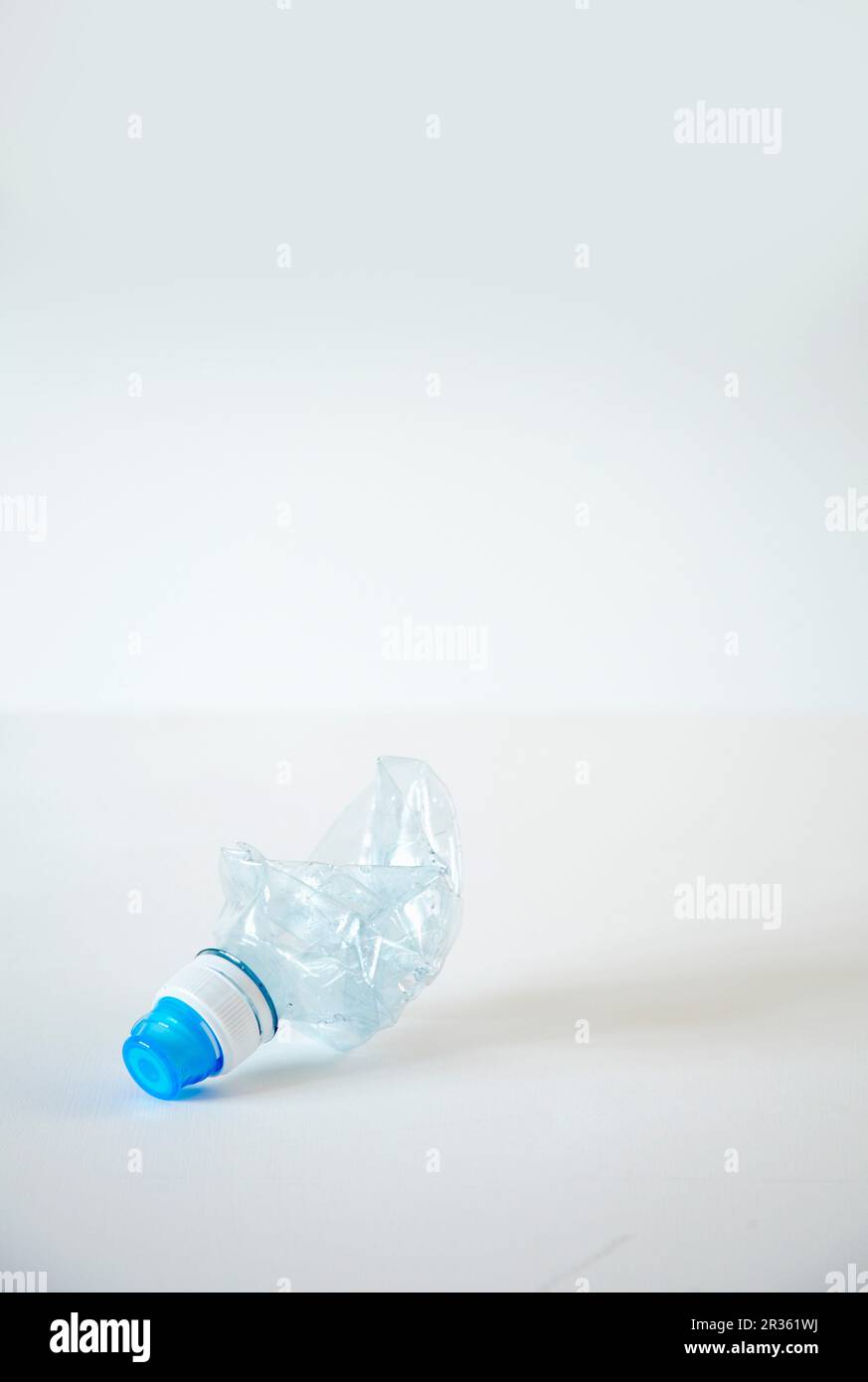 An empty squashed plastic water bottle Stock Photo - Alamy
