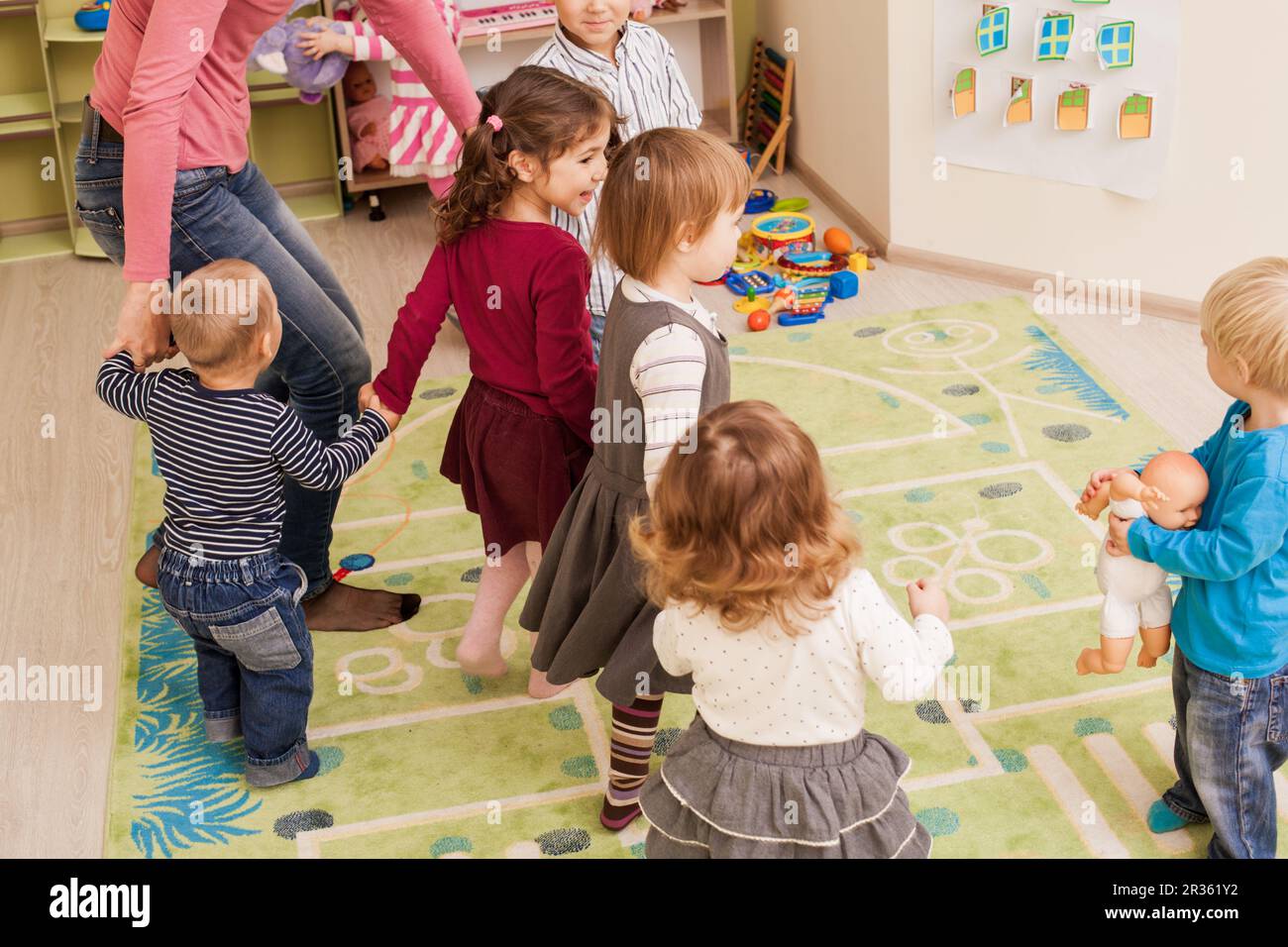 Group of little children dancing Stock Photo - Alamy