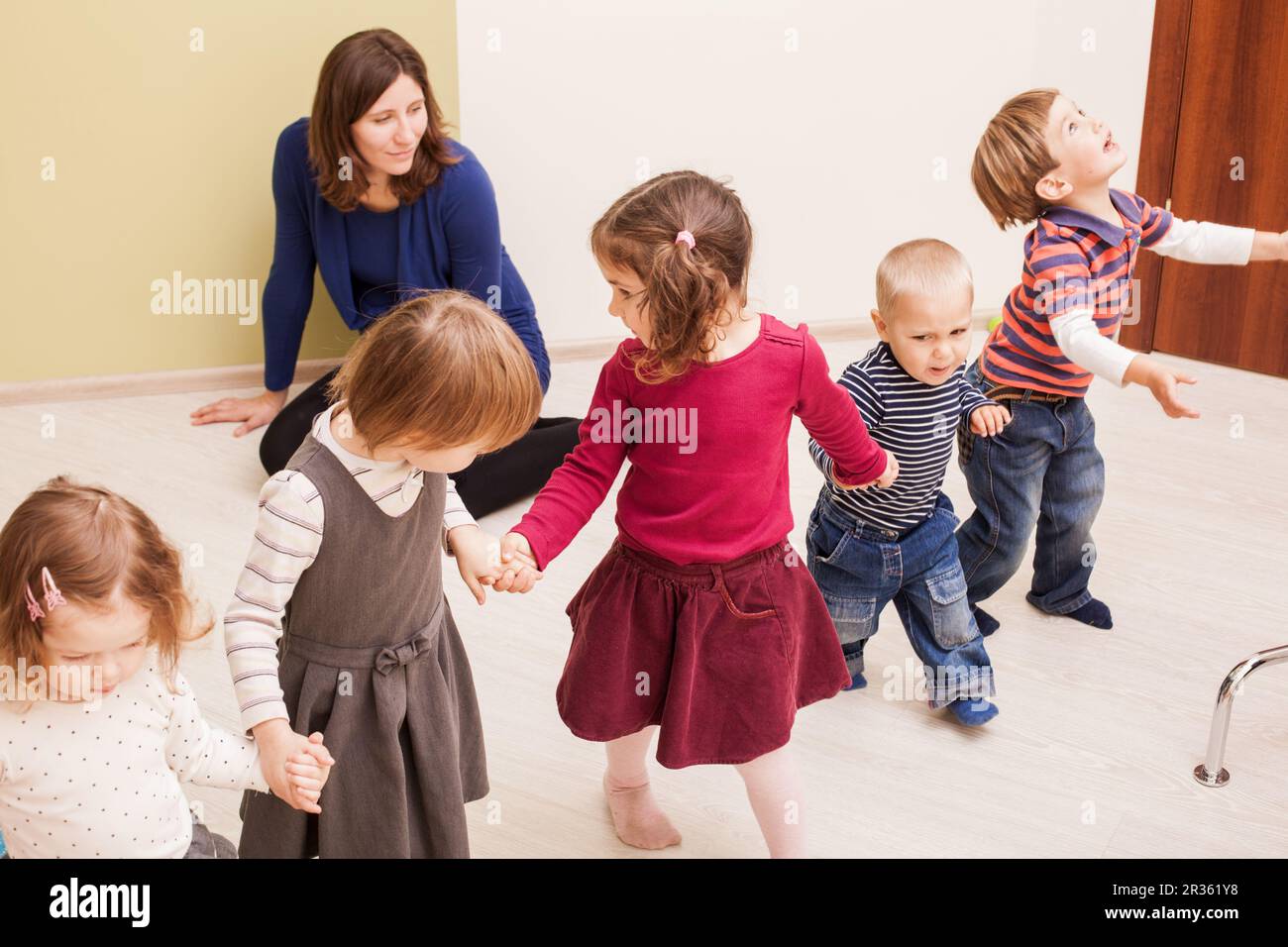 Group of little children dancing Stock Photo - Alamy