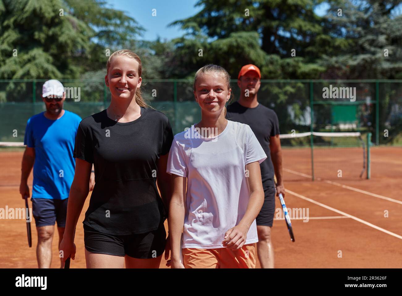 Tennis club together after hard training, showing their dedication ...