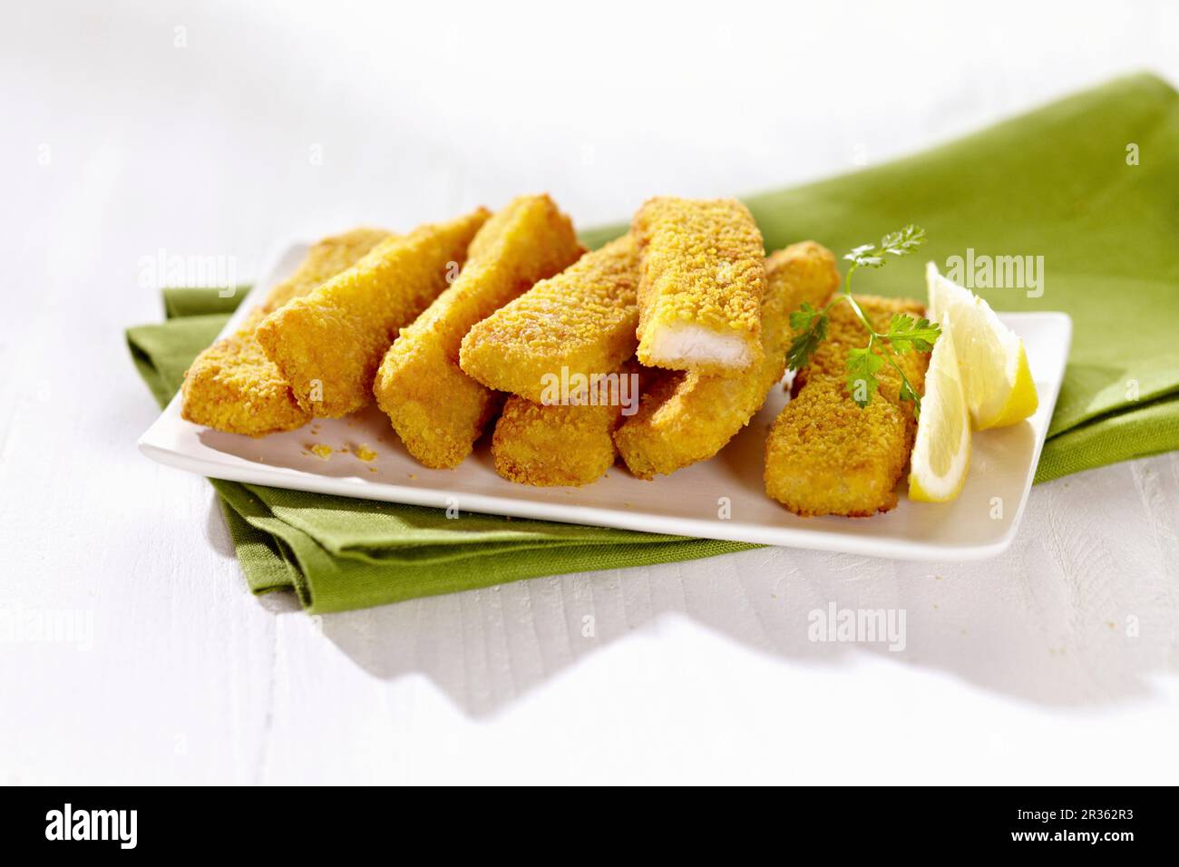 Fish fingers on a serving platter Stock Photo - Alamy