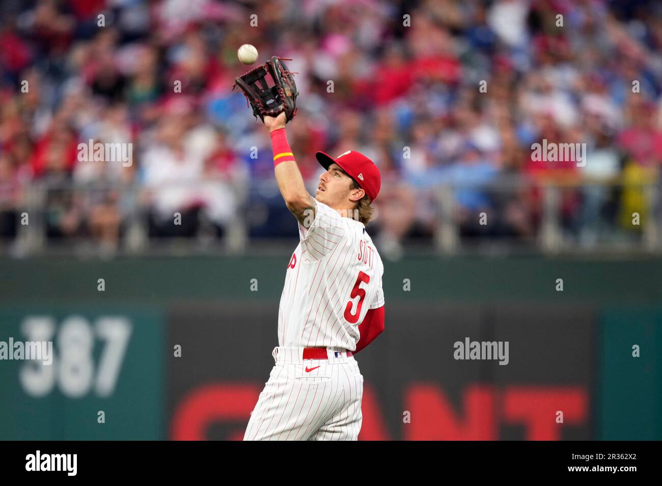 Philadelphia Phillies second baseman Bryson Stott catches a fly out by ...