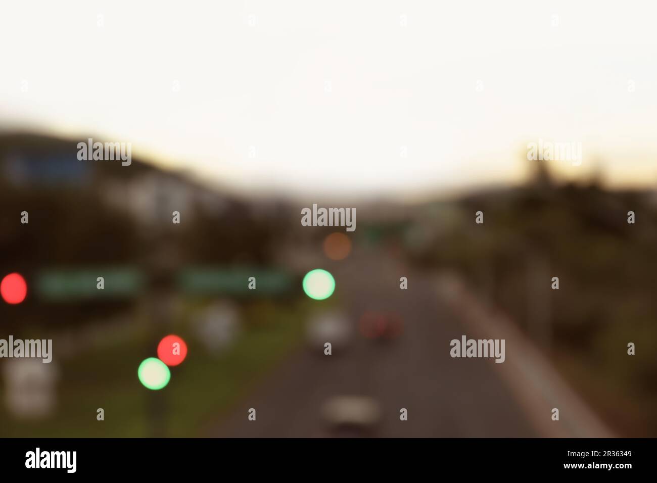 Blurred view of highway in city at evening Stock Photo - Alamy