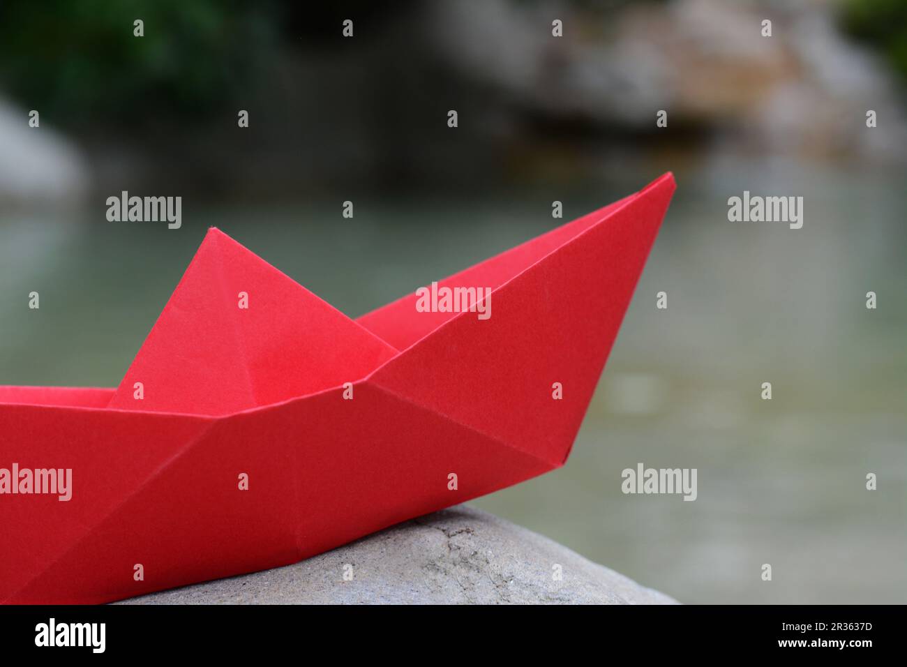 Little red paper boat hi-res stock photography and images - Alamy