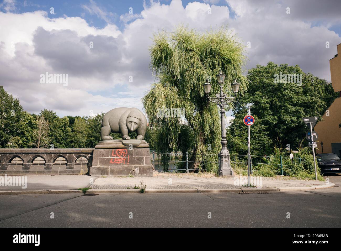 Statue of a fat bear at the bridge, in Tiergarten, Berlin, Germany - may 2023. High quality ...