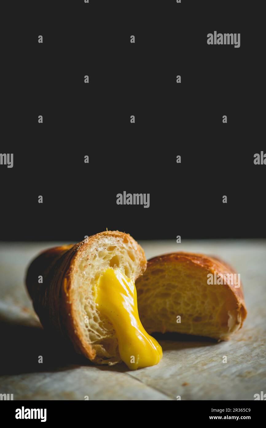 A cream-filled croissant Stock Photo - Alamy