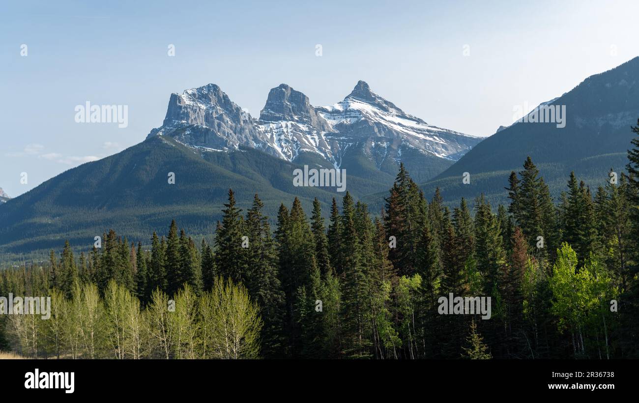 Beautiful view of Three sisters peaks near Canmore Canada Stock Photo ...