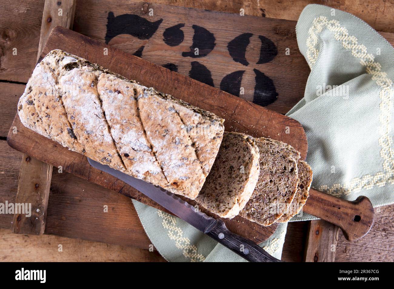Spelt and wild garlic bread with flax seeds, sliced Stock Photo - Alamy
