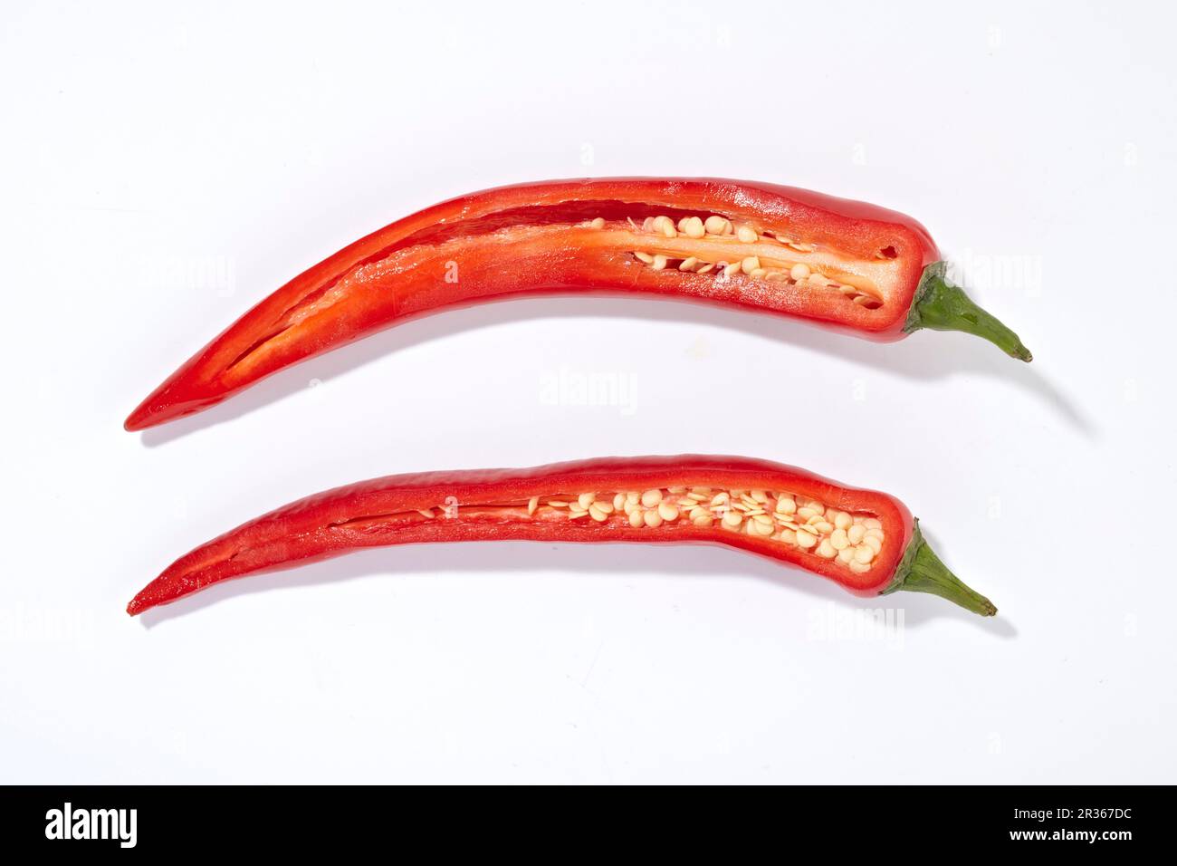 Two halves red chili hi-res stock photography and images - Alamy