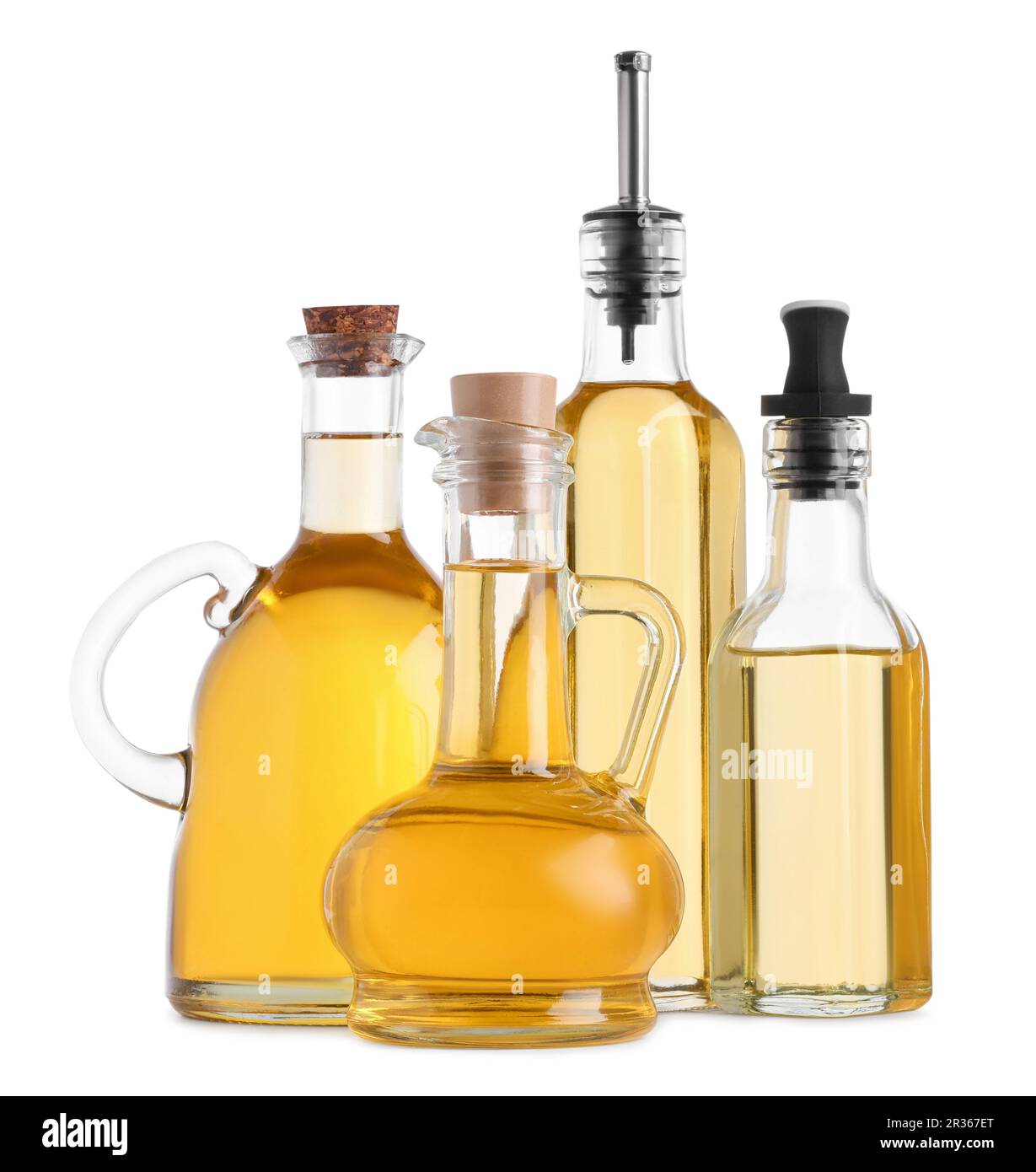 Different glass bottles of cooking oil on white background Stock Photo ...