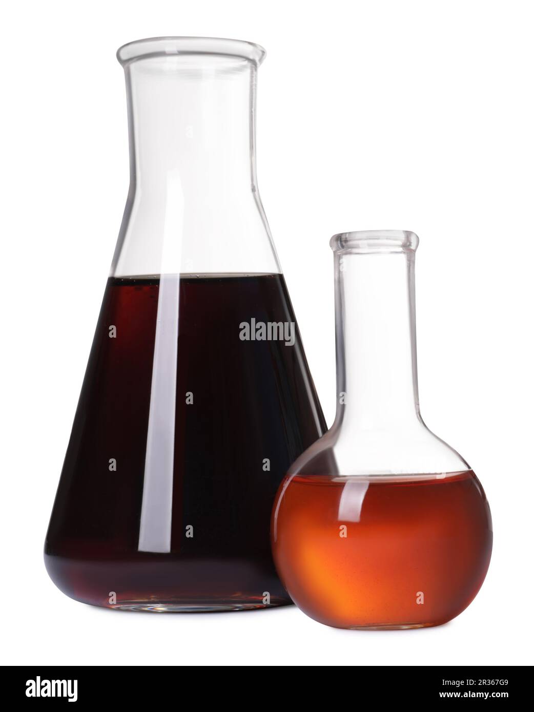 Laboratory glassware with brown liquids on white background Stock Photo ...