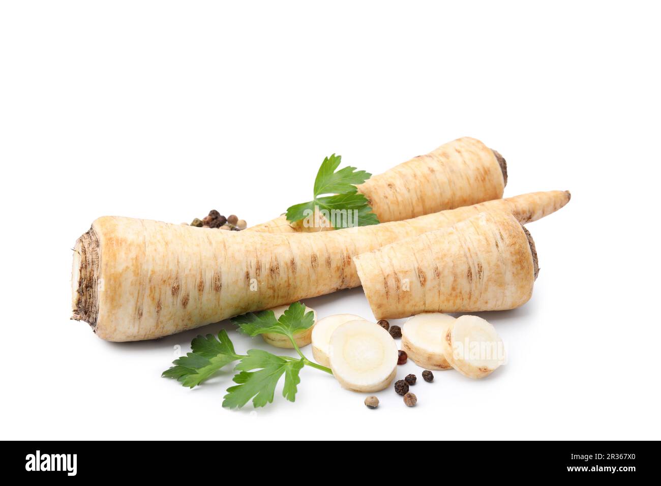 Whole and cut raw parsley roots, fresh herb isolated on white Stock ...