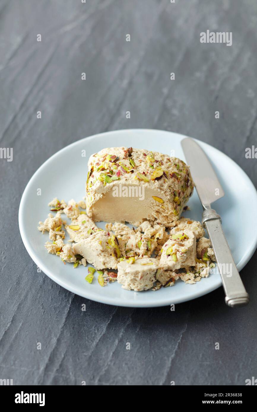 Turkish Halva with pistachio nuts Stock Photo - Alamy
