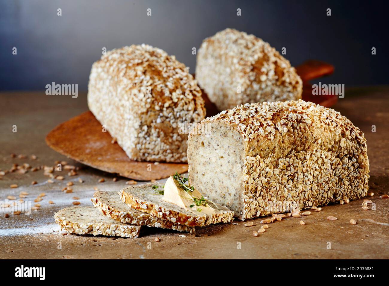 Chia and spelt bread with cream cheese and garden cress Stock Photo - Alamy