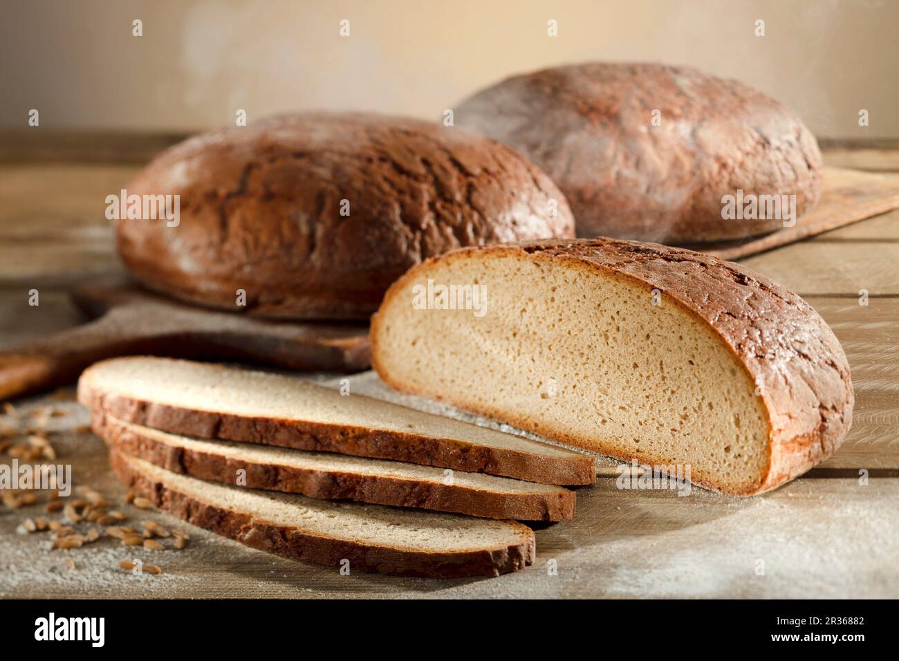 Three loaves of country bread (wheat and rye) with rye grains Stock ...
