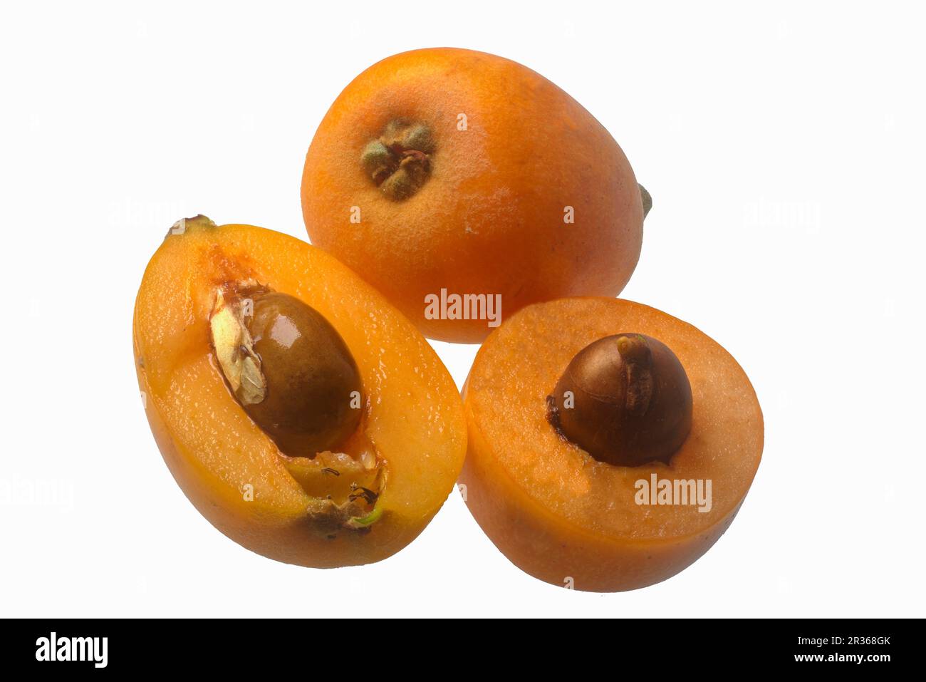 Loquats, whole and halved Stock Photo - Alamy