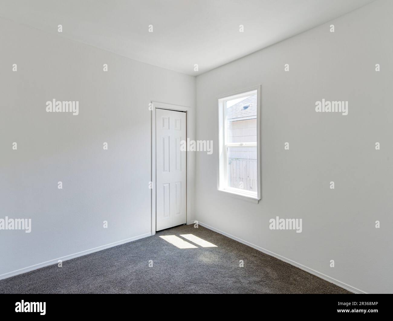 Modern residential empty bedroom interior Stock Photo - Alamy