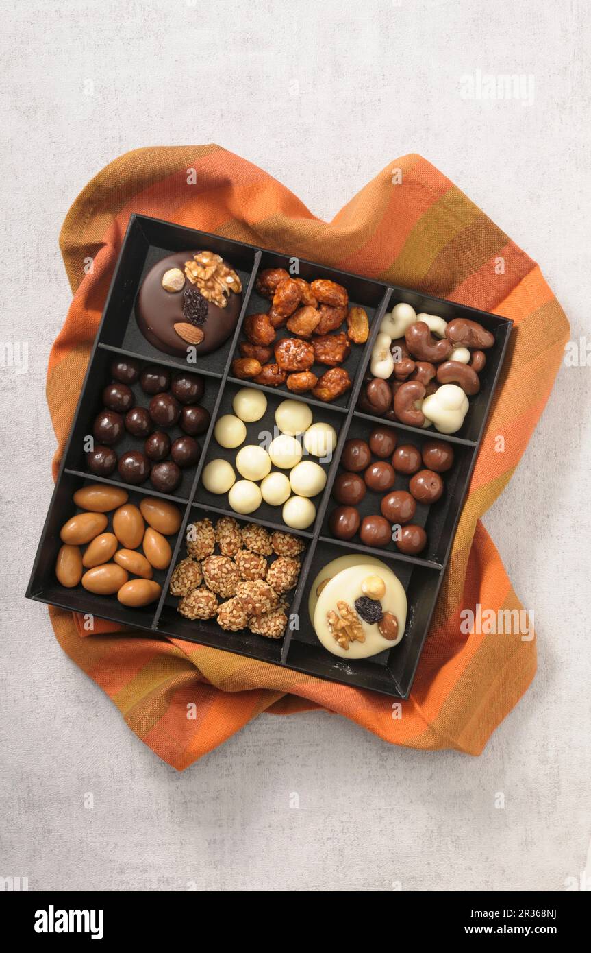 Various pralines and sweets in a box Stock Photo - Alamy